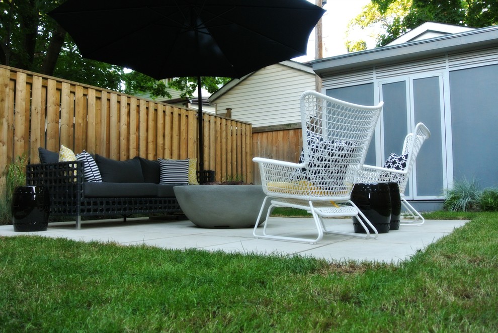Mid Century Modern glam urban backyard with fire pit, limestone patio ...
