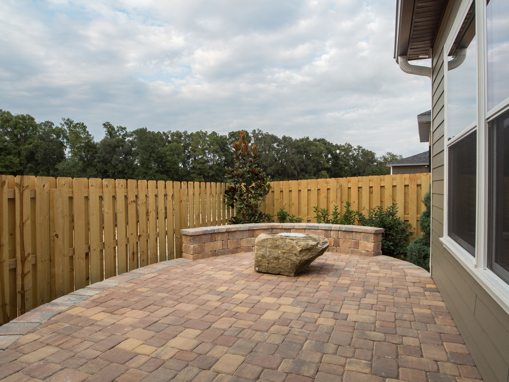 Model Home Backyard Fire Pit - Craftsman - Patio - Miami - by ...