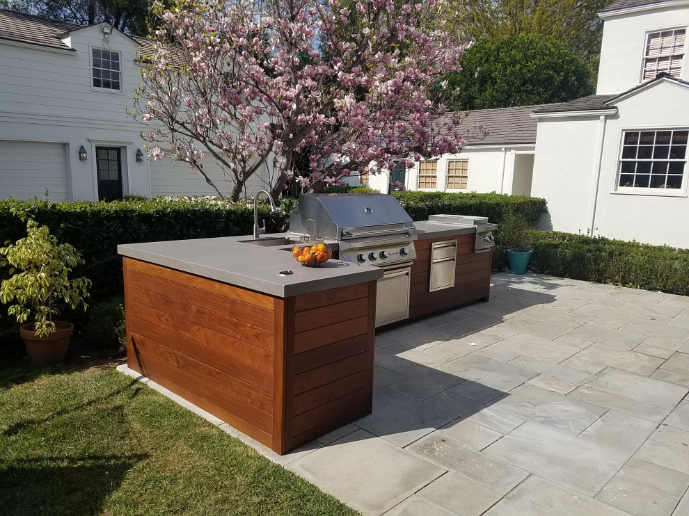 Modern L-Shaped Island with Teak wood walls - Traditional - Patio - Los ...
