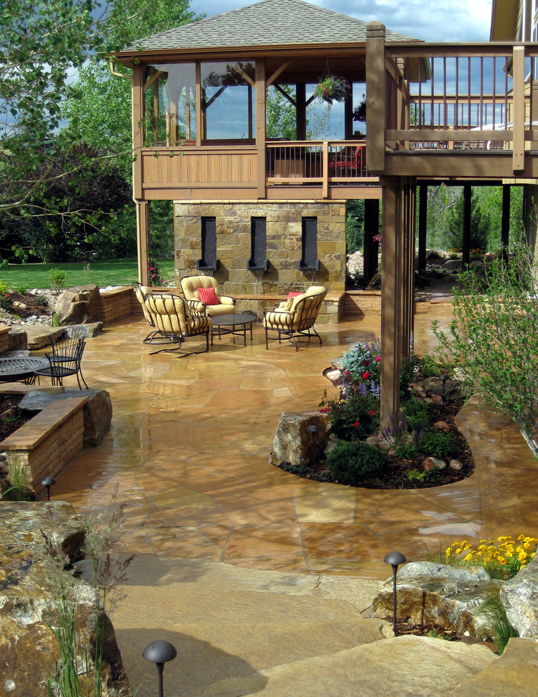 Naturalistic Flagstone Patio with a Custom Water Feature - Traditional ...