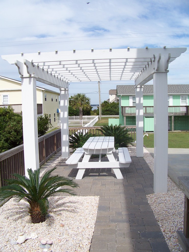 Oceanfront retaining wall, walkway and driveway - Beach Style - Patio ...