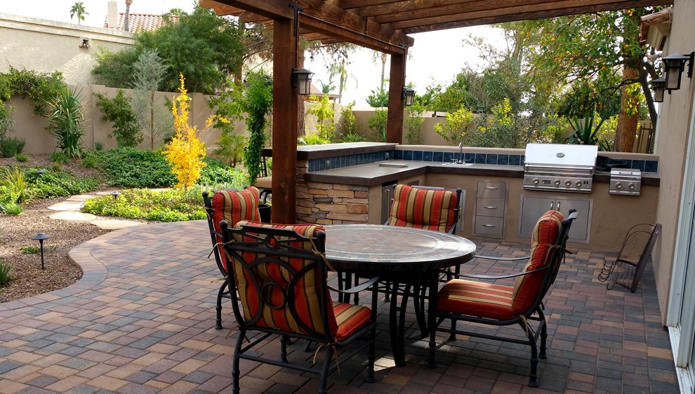 old world chefs kitchen with undermount LEDs misters pergola dining ...