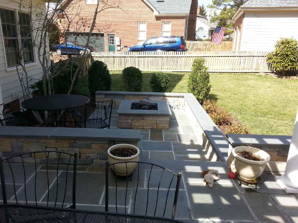Outdoor kitchen and pergola with a bluestone patio - Patio - Richmond ...
