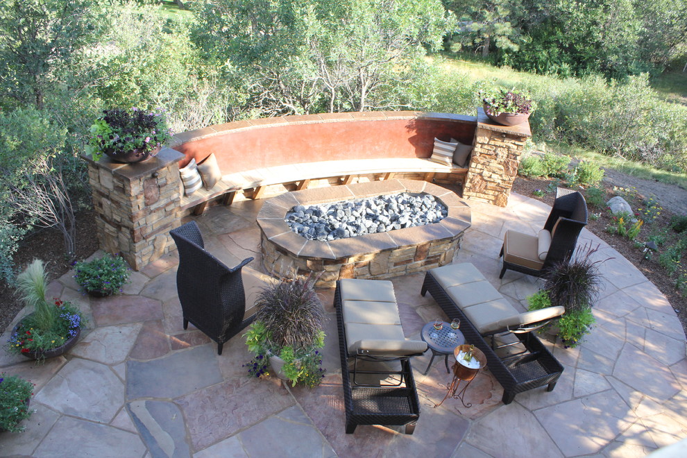 Oval Firepit with bench seating and flagstone pato - Traditional ...