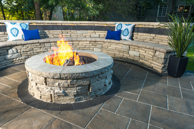 Patio with a Unilock Rivercrest Fire Pit Kit and Seating Wall ...