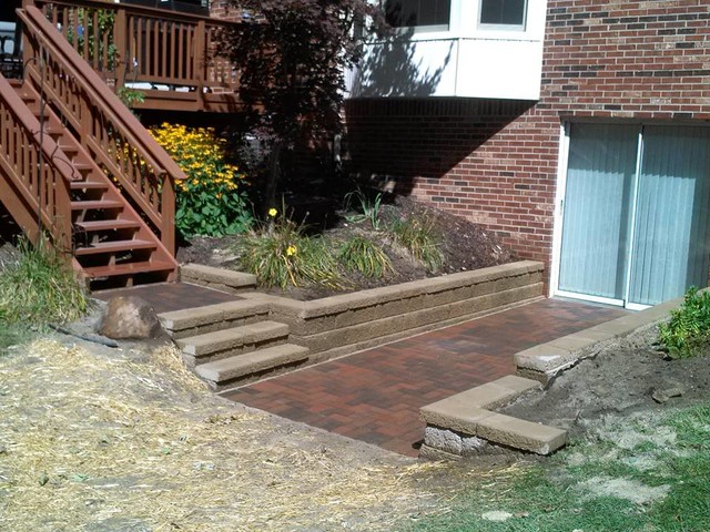 Plymouth walk out basement patio with retaining walls - Contemporary ...