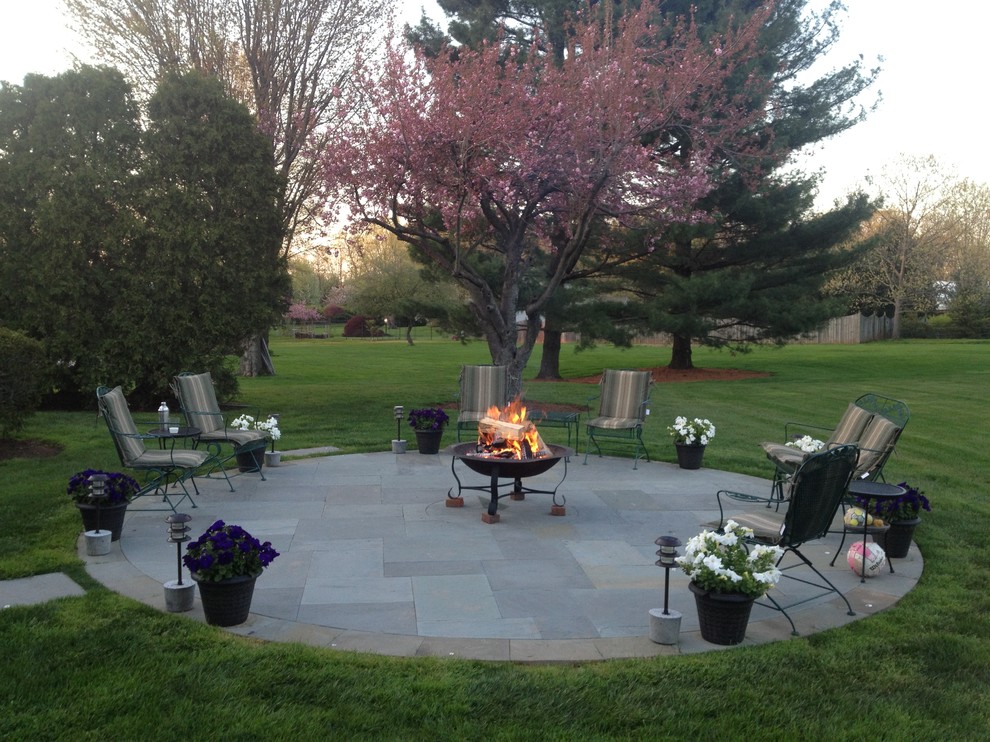 Radius flagstone terrace with compass feature - Traditional - Patio ...