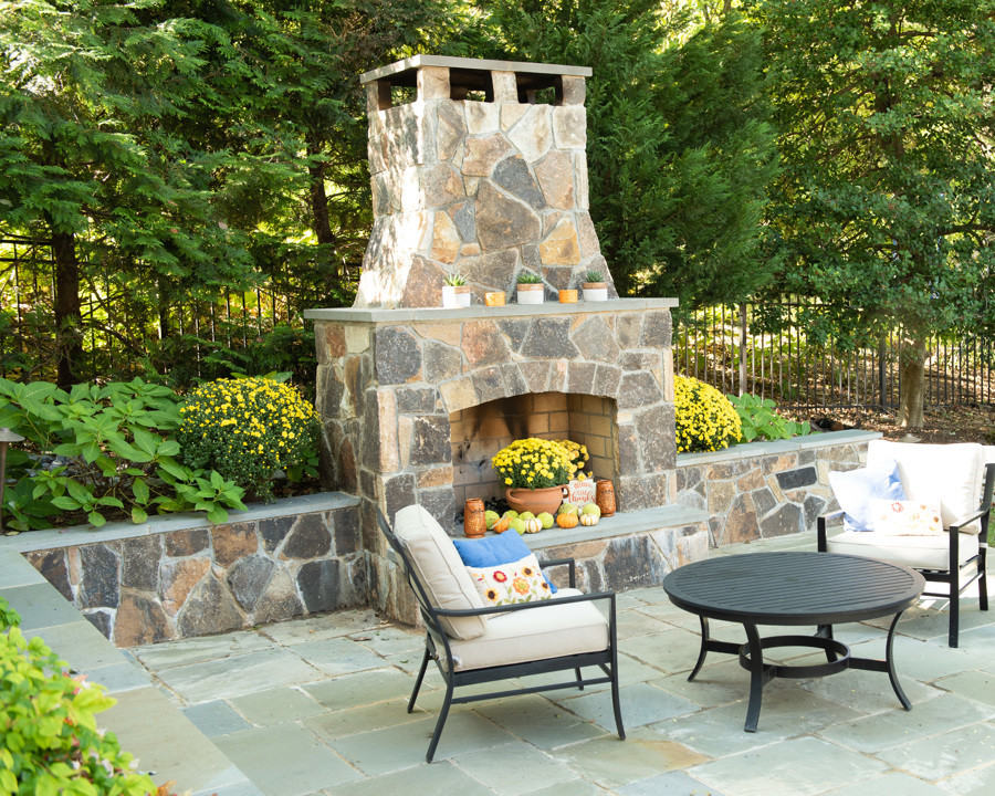 Stone backyard chimney, patio, retaining walls, outdoor kitchen, and ...