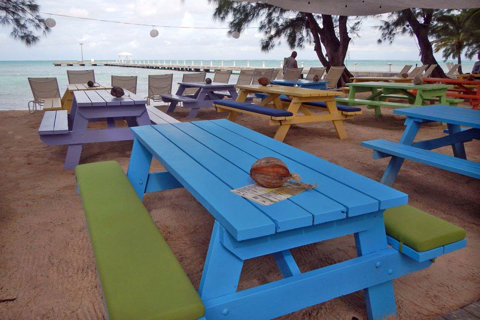 Sunbrella RAIN bench cushions add playful vibe to beach picnic tables ...