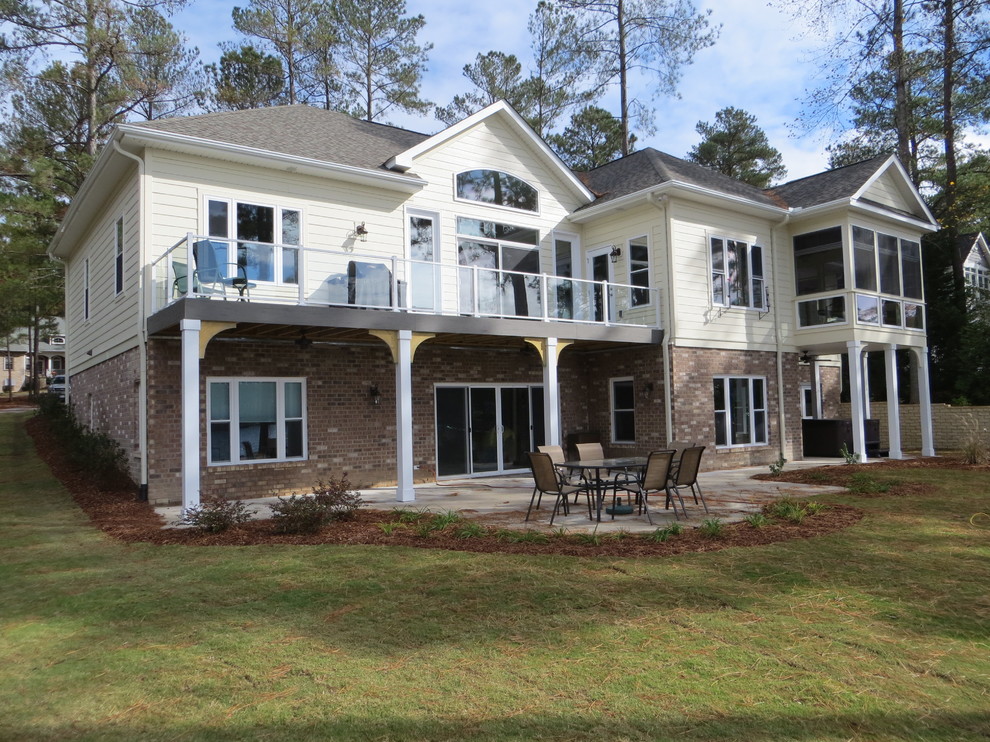 Traditional Lake Front Home with Walk Out Basement - Traditional ...