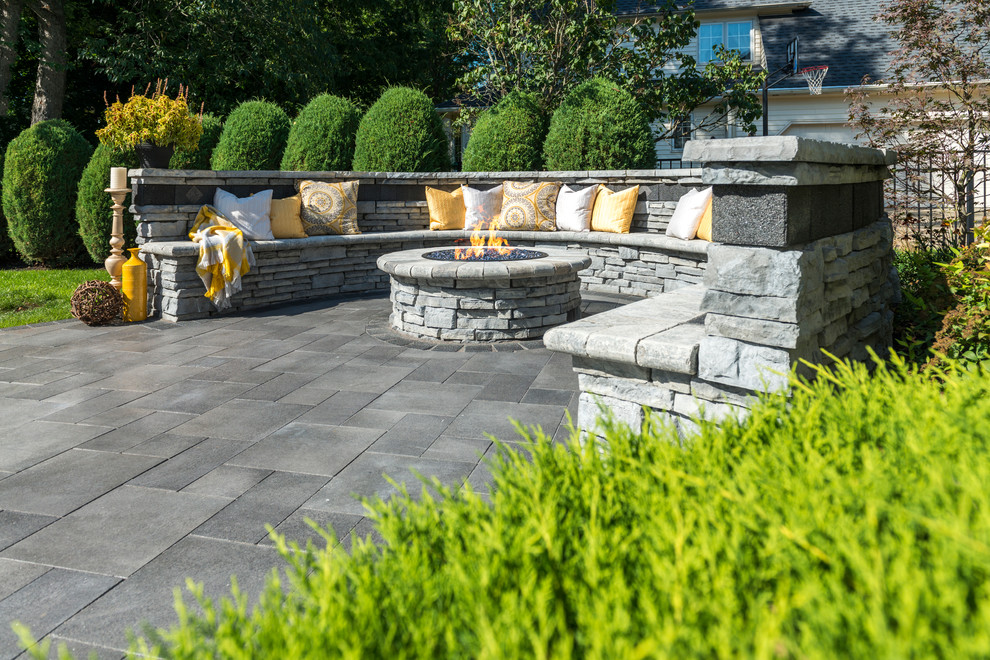 Unilock Umbriano Patio and Rivercrest Fire Pit and Seat Wall ...