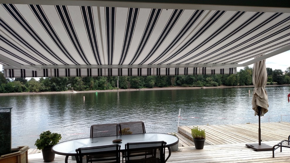 Waterside patio retractable awning - Beach Style - Patio - Portland ...