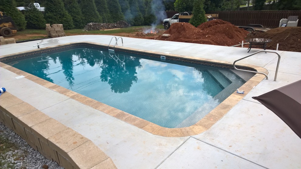 2' Radius pool with custom steps and bench and travertine coping - Pool ...