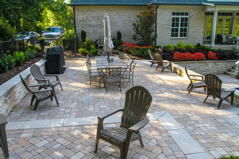AFTER WITH PAVERS PUT IN: Pool with firepit, english garden, large ...