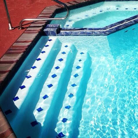 Art Deco tiles with safety rail - Traditional - Pool - Houston - by ...