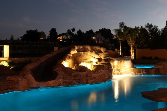Backyard porch and pool with waterfall and slide. - Classique - Piscine ...
