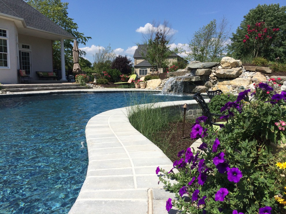 Bethlehem Township pool and spa with waterfall and sunshelf ...