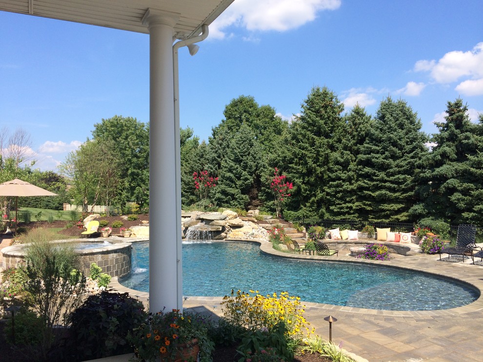 Bethlehem Township pool and spa with waterfall and sunshelf ...