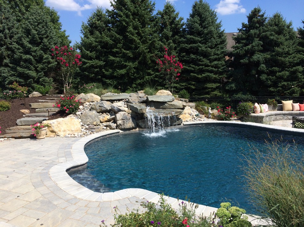 Bethlehem Township pool and spa with waterfall and sunshelf ...
