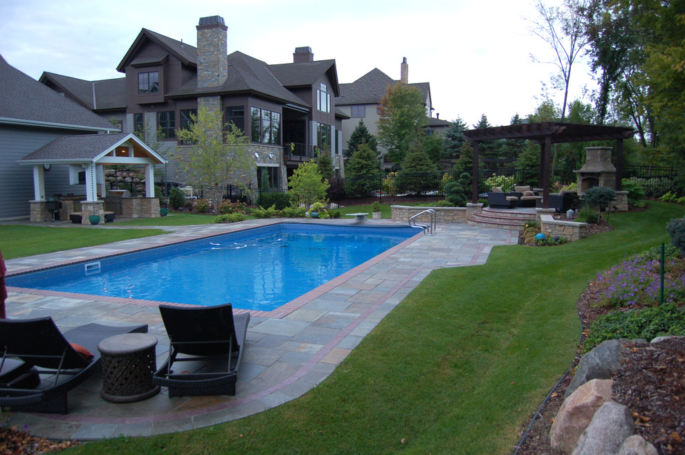 Bluestone pool decks, arbors, fireplaces, outdoor kitchen under ...