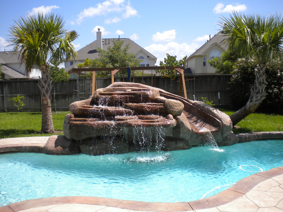 Boulder Slide/ Folding doors - Tropical - Pool - Houston - by OLeary Pools and Design | Houzz