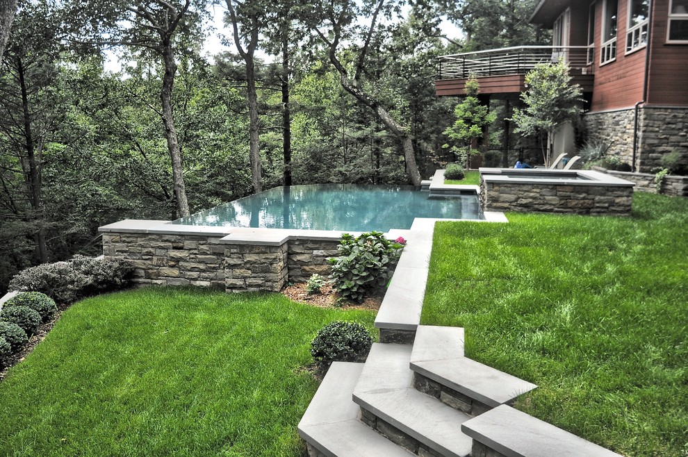 cliffside vanishing edge pool with raised spa + surge current ...