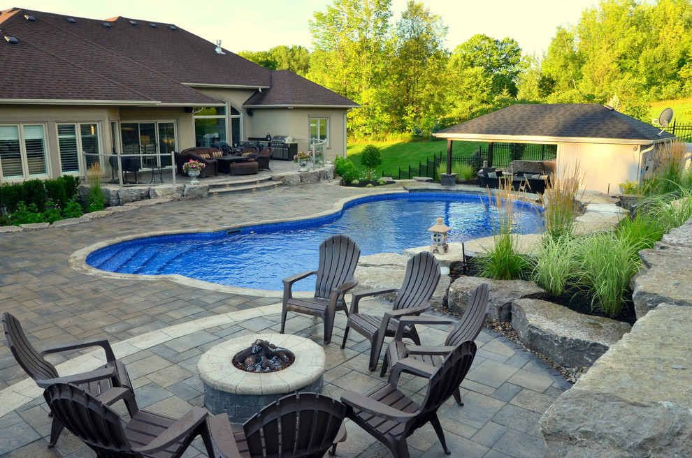 Curvaceous Pool and multi level patio - Coastal - Swimming Pool & Hot ...