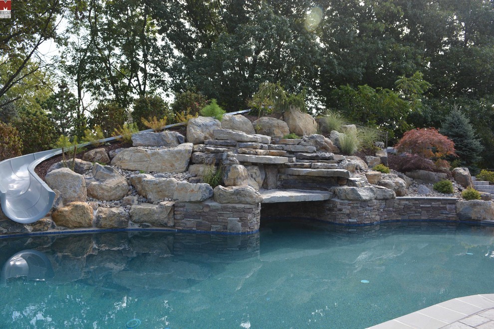 Custom Freeform style salt water in ground pool with Waterslide and Spa ...