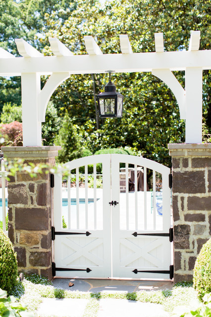 Custom gates lead to a relaxing inground pool - Traditional - Pool ...