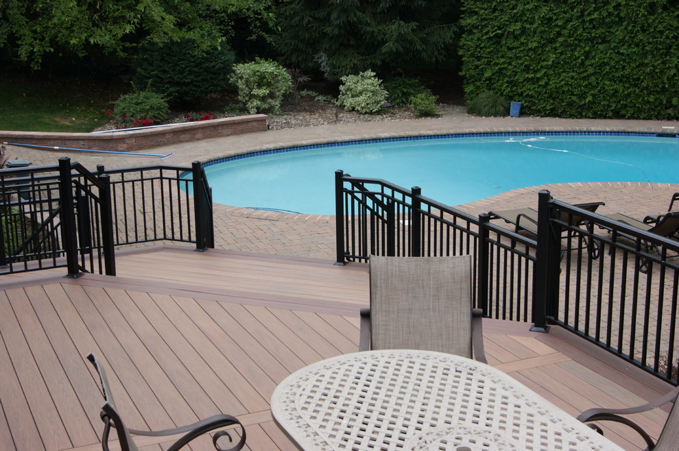 Elegant deck design from interior to poolside - Traditional - Pool ...