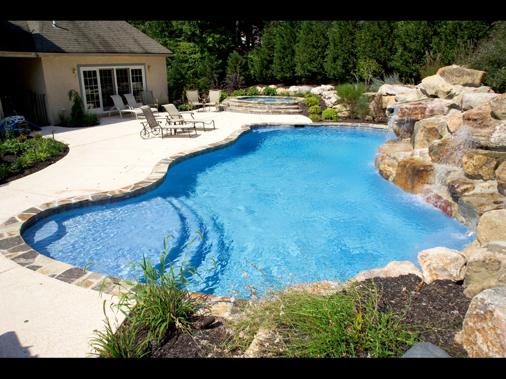 FREE FORM POOL WITH SEPARATE SPA WITH WATER FALL AND NATURAL STONE ...