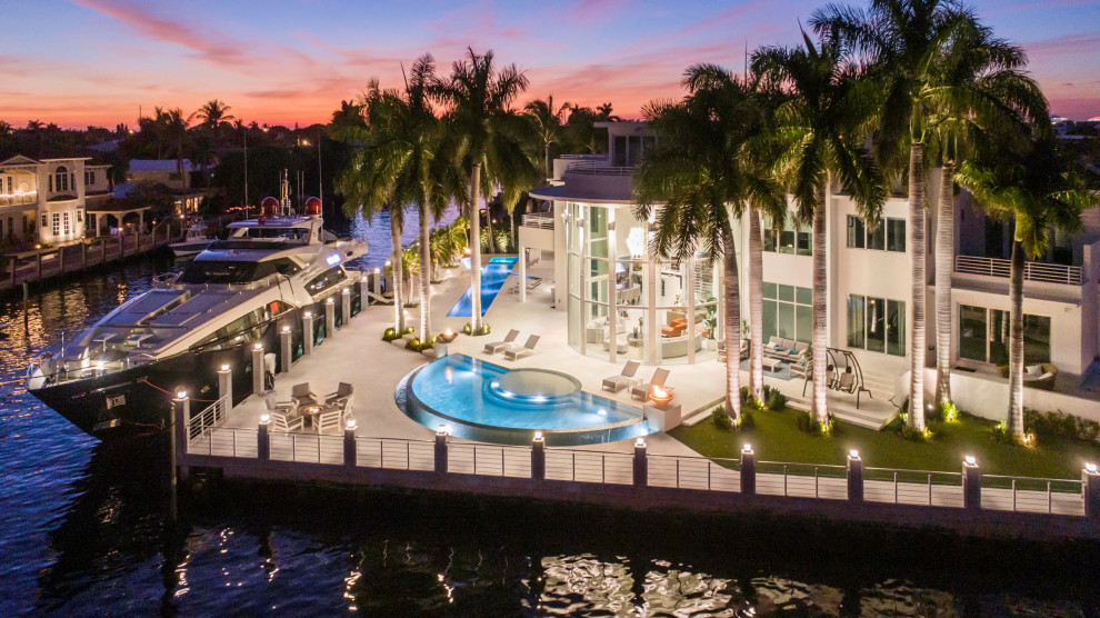 Freeform Infinity Edge Pool with Lap Pool/Spa with Fire Bowls in Ft ...