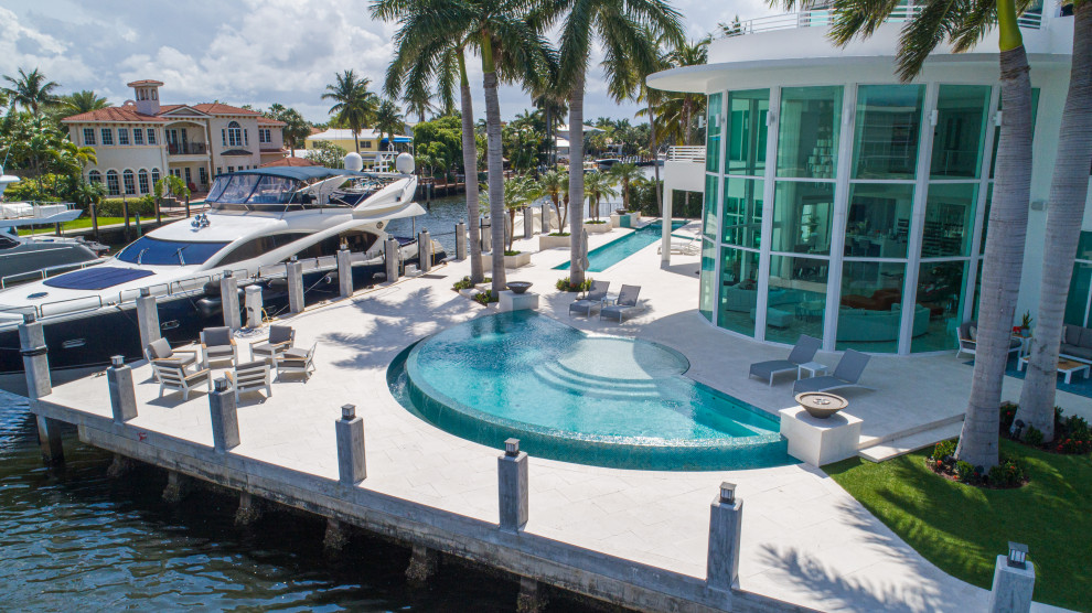 Freeform Infinity Edge Pool with Lap Pool/Spa with Fire Bowls in Ft ...