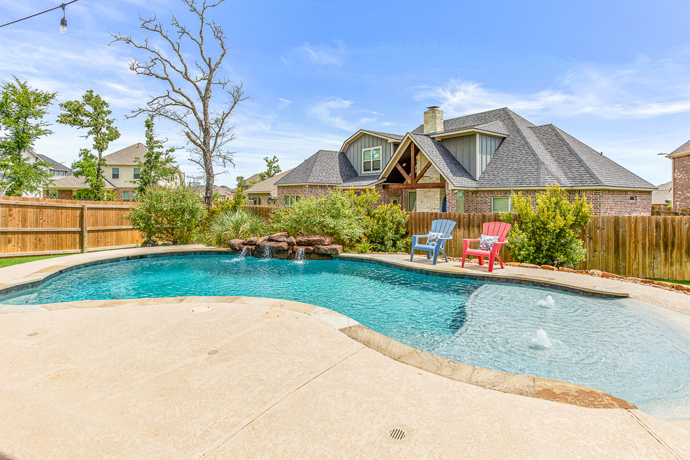 Freeform Pool, beach entry and rock waterfall - Beach Style - Pool ...