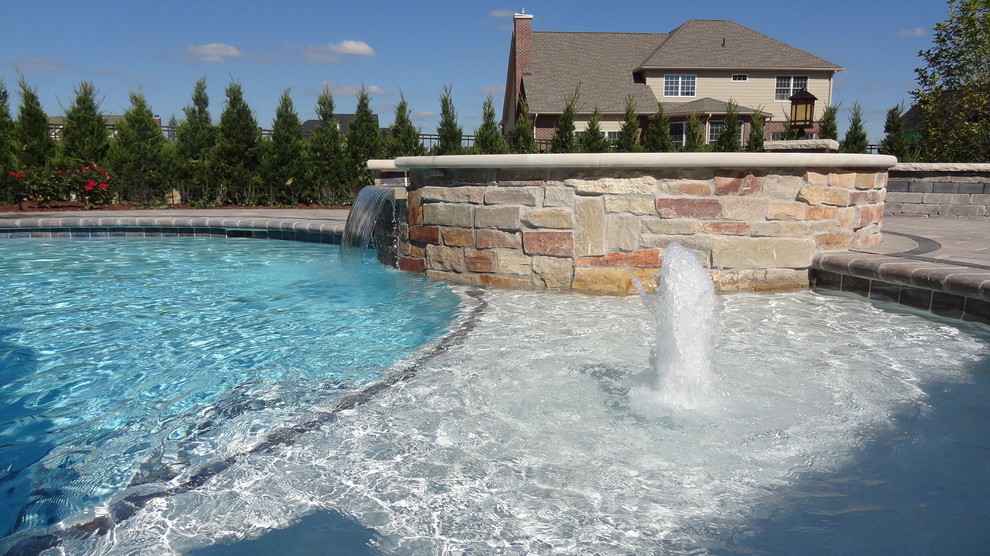 Freeform Pool with Raised Spillover Spa and Water Feature - Traditional ...