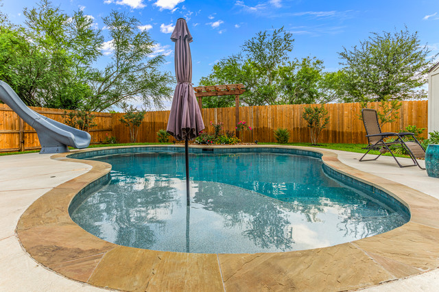 Freeform Pool with Sunshelf and Slide - Tropical - Pool - Other - by ...