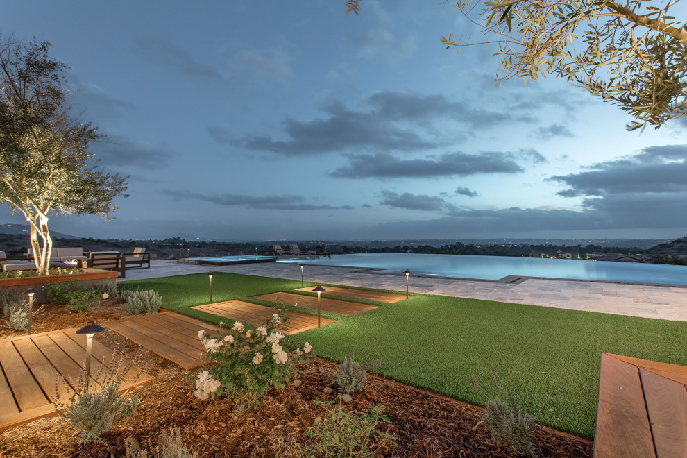 Gorgeous Infinity Pool with mulitple outdoor living spaces ...