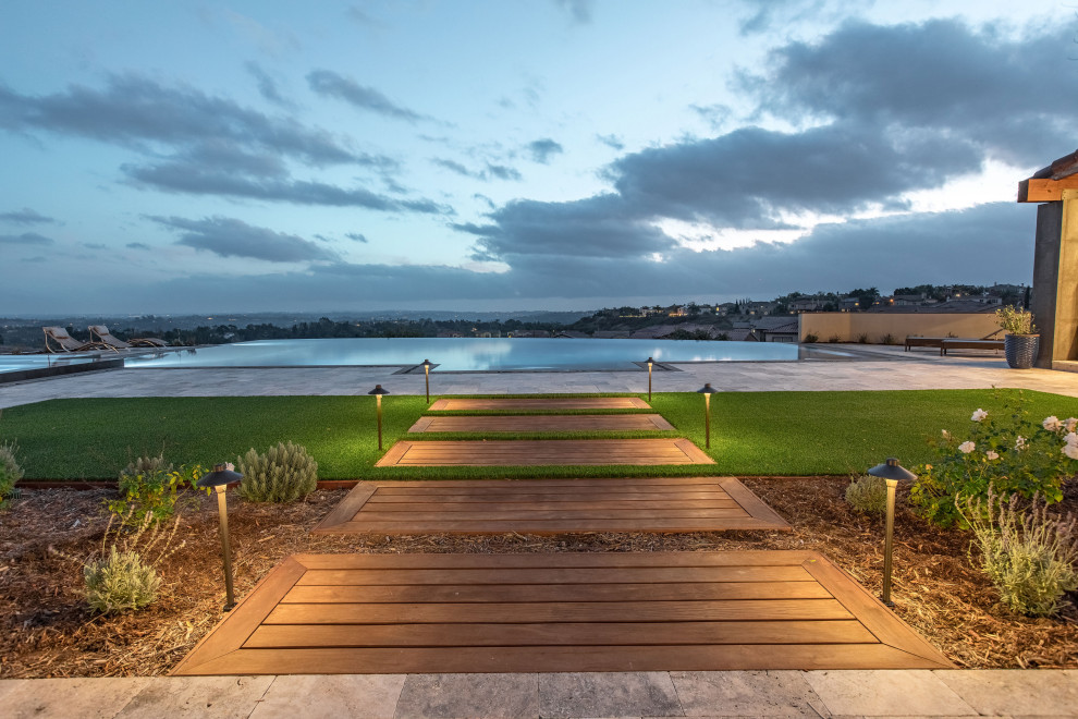 Gorgeous Infinity Pool with mulitple outdoor living spaces ...