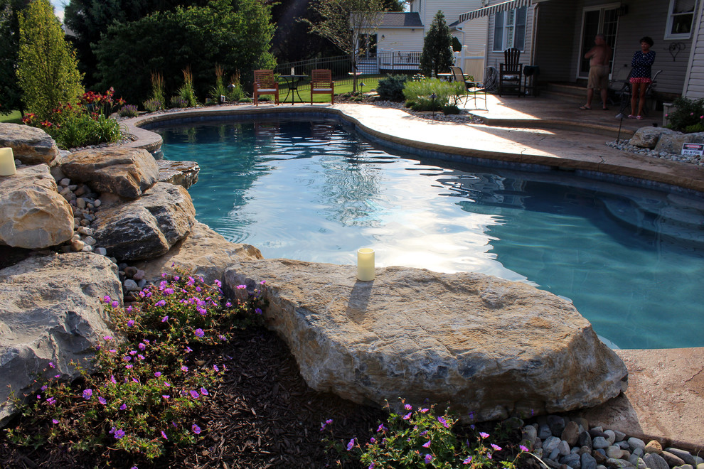 Hanover Township custom pool with boulder waterfall - Traditional ...