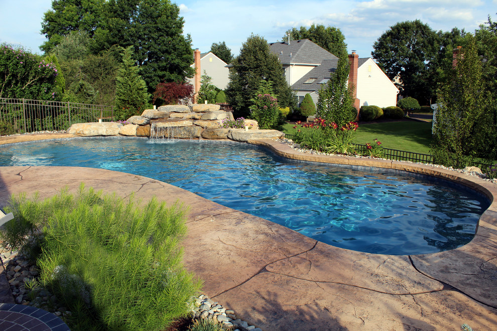 Hanover Township custom pool with boulder waterfall - Traditional ...