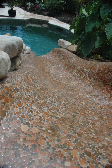 Hidden slide and tropical pool! - Tropical - Swimming Pool & Hot Tub ...