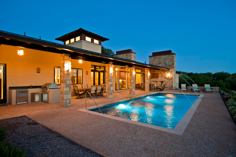 Hill Country Modern Parade Home Rear Elevation at Dusk Swimming Pool ...