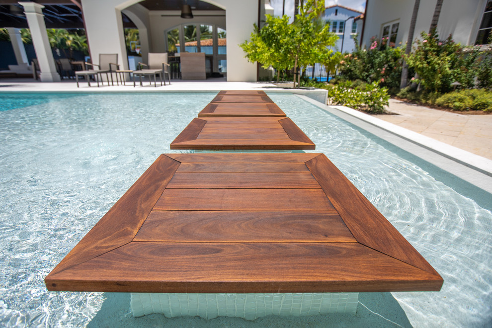 Infinity Edge Pool With Custom Stepping Stones in Miami Beach - Pool ...