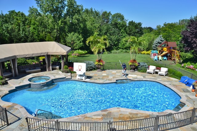 Kid Friendly Tropical Poolside Backyard - Traditional - Pool - Newark ...