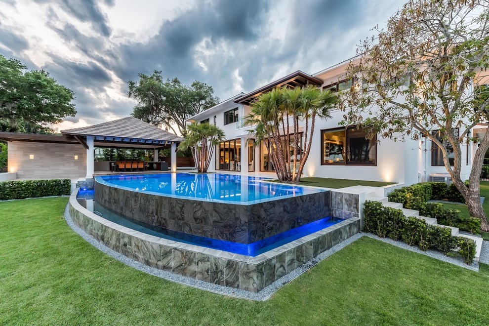 Lakeside Pool with Infinity Edge and Tile Interior-3 - Tropical - Pool ...