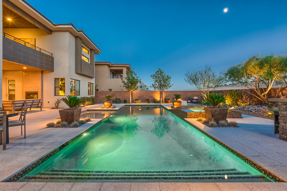 Lap Pool with Rim Flow Spa & Fire Pit - Tropical - Pool - Las Vegas ...