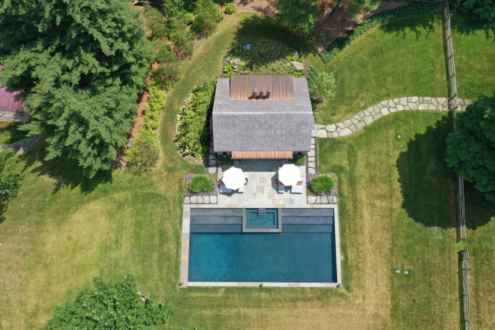 large rectangular pool with oversized steps + interior spa ...