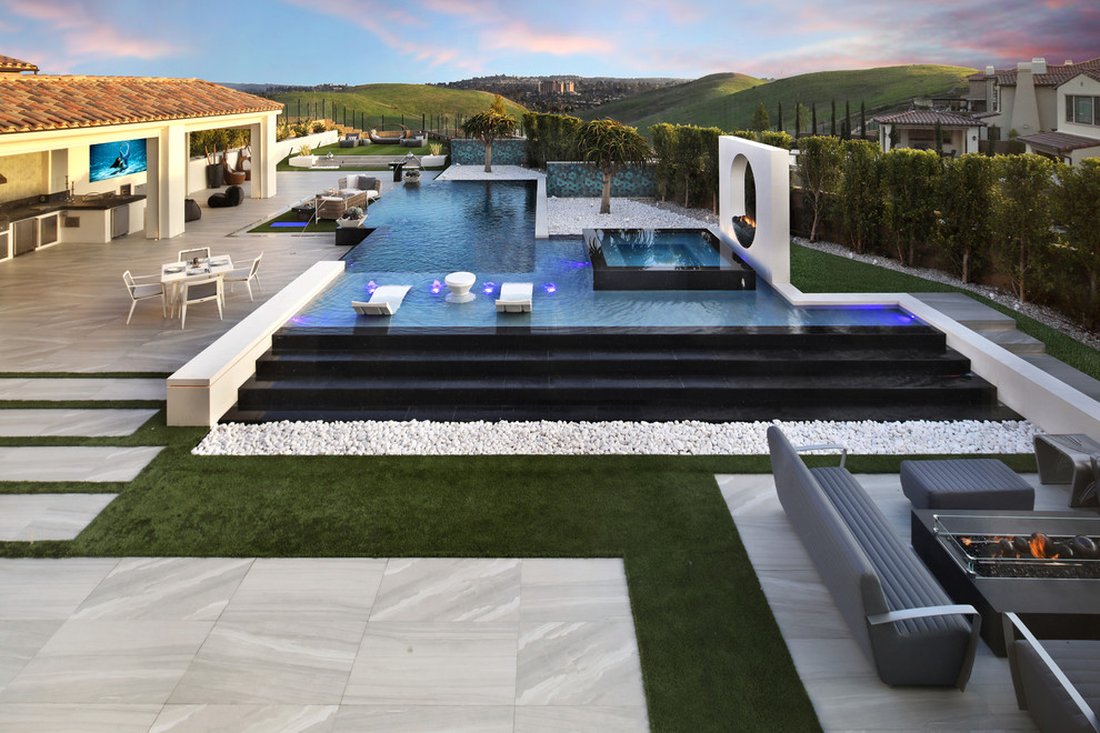 Modern Infinity Pool, Elevated Spa, Outdoor Kitchen, and Unique Fire ...