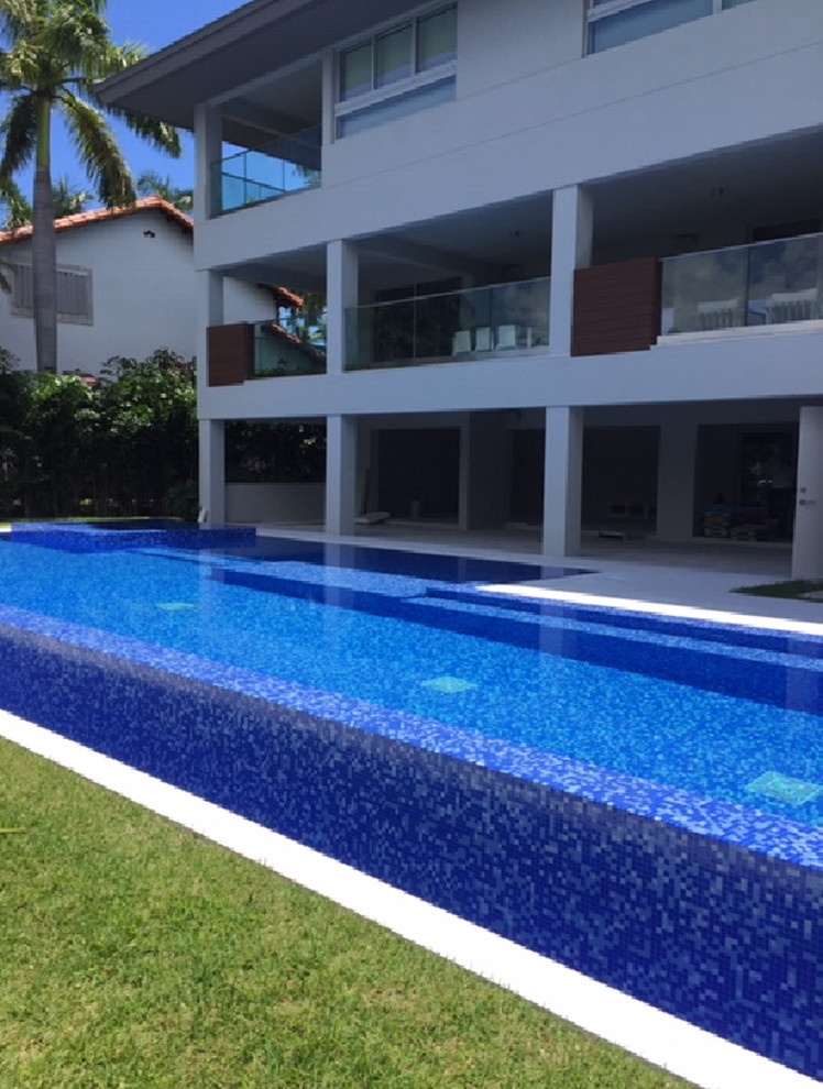 Modern pool with blue recycled glass tile - Modern - Pool - Miami - by ...