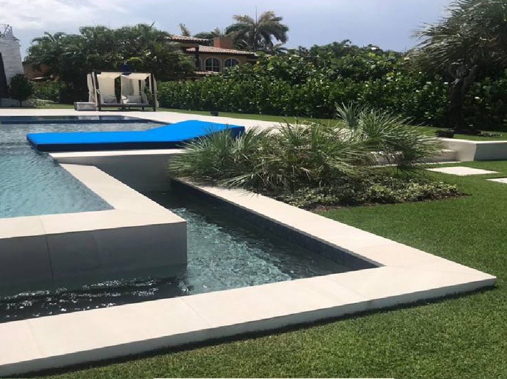 Modern pool with light colored stone look porcelain tile - Modern ...